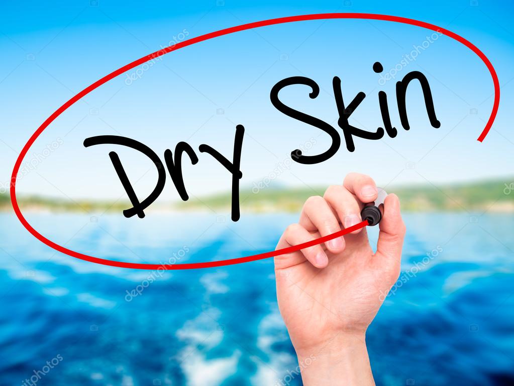 Man Hand writing Dry Skin with black marker on visual screen — Stock ...