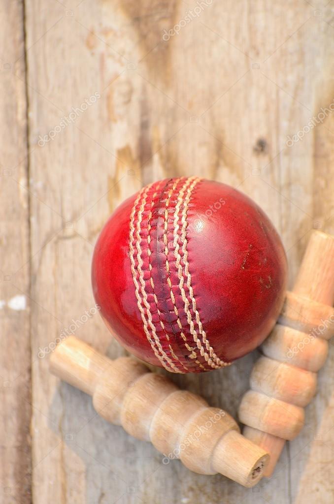 Cricket ball and bails Stock Photo by ©sbhaumik 103025638