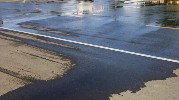 Water leak road Stock Photos, Royalty Free Water leak road Images ...