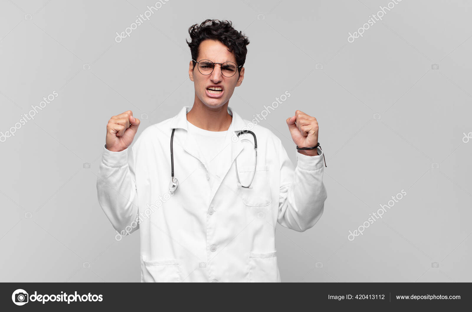 Young Physician Shouting Aggressively Angry Expression Fists Clenched ...