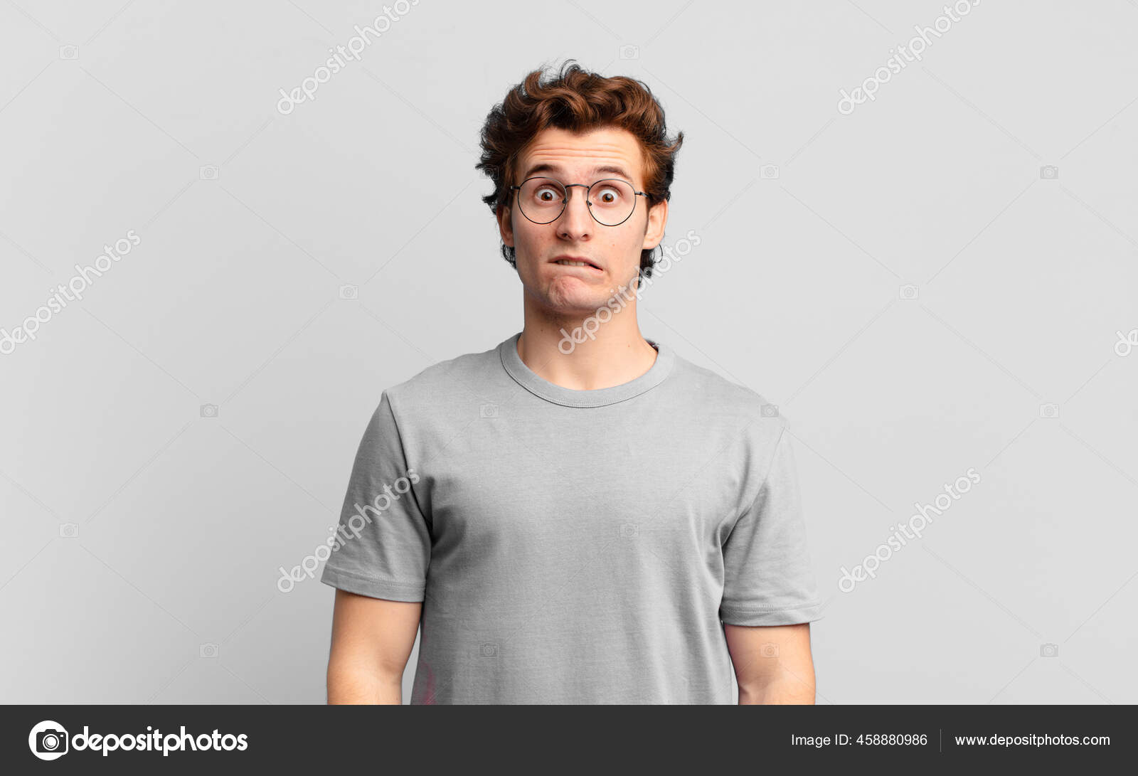 Young Handsome Boy Looking Puzzled Confused Biting Lip Nervous Gesture ...