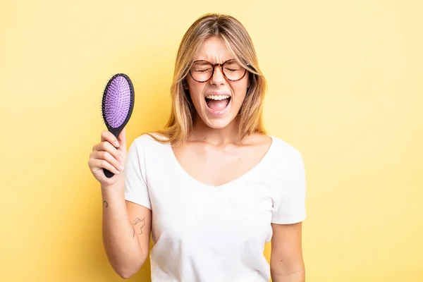 Aggressive brushing Pictures, Aggressive brushing Stock Photos & Images ...