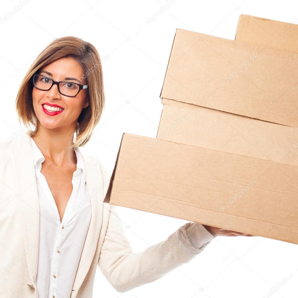 Young cool woman with boxes Stock Photo by ©kues 62184971