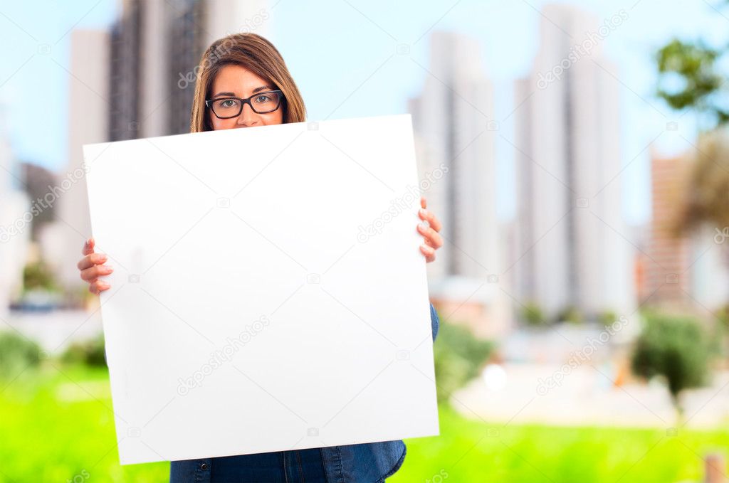 Young cool woman with a placard — Stock Photo © kues #65264393