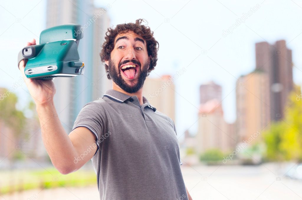 Young crazy man taking a photo Stock Photo by ©kues 65267505