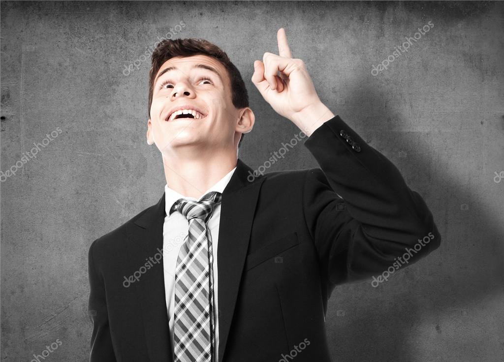 Businessman pointing up Stock Photo by ©kues 75056627