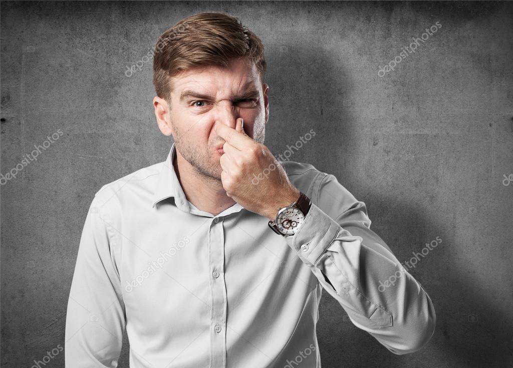 Blond man bad smell sign Stock Photo by ©kues 75057065