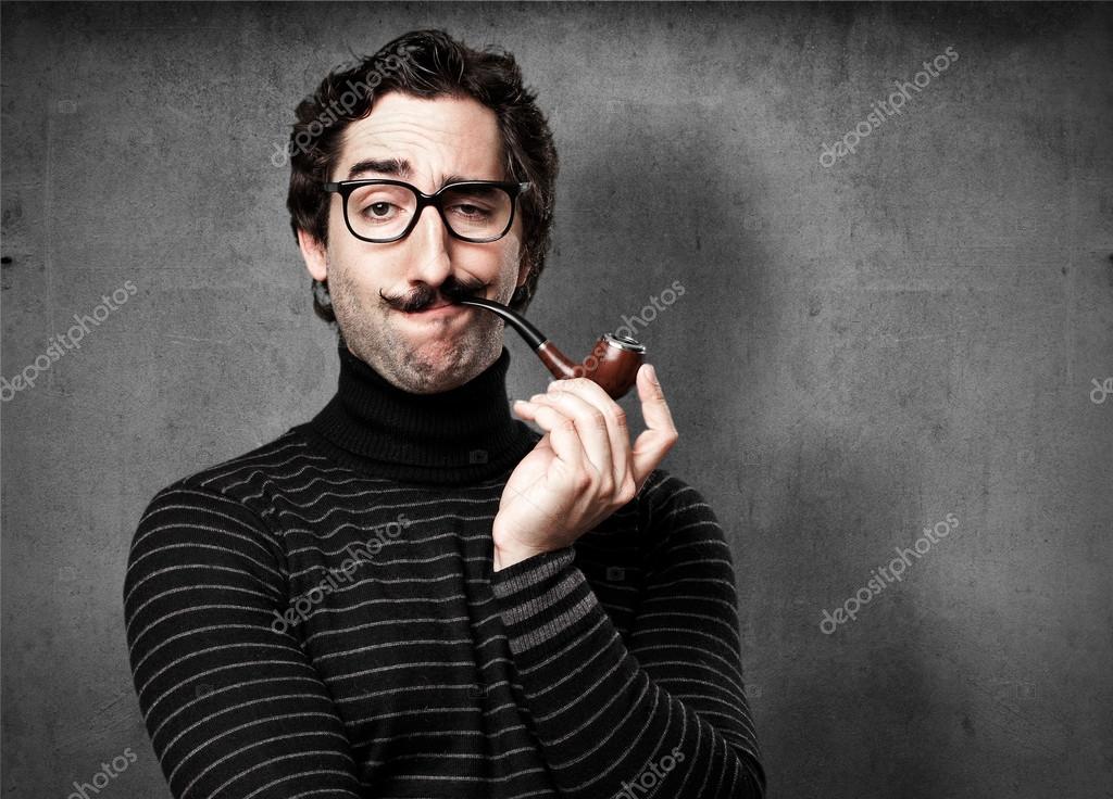 Pedantic man with a pipe Stock Photo by ©kues 75058679