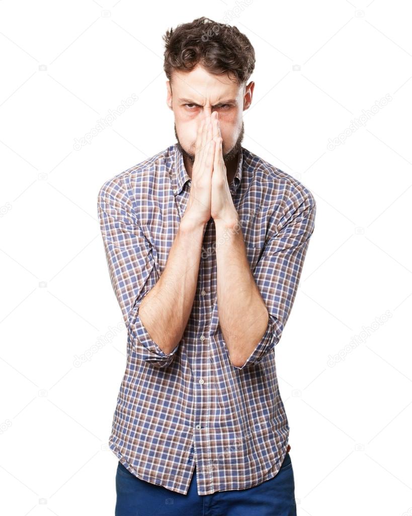 Sad young man praying — Stock Photo © kues #83240720