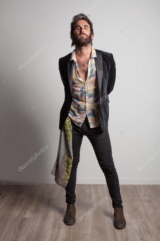 Rock musician posing in studio — Stock Photo © kues #83301428