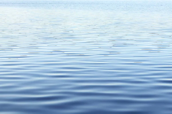 River water surface with waves as nature background. Ripple water ...