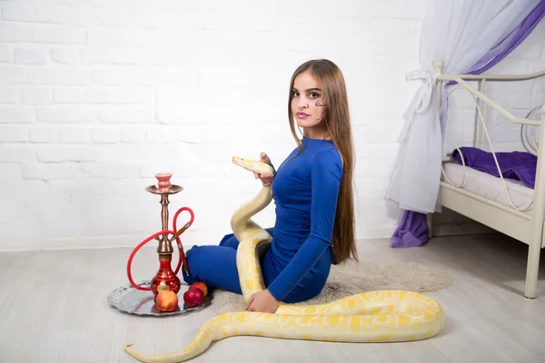 Beautiful woman with python — Stock Photo © OlgaOsa #111808064