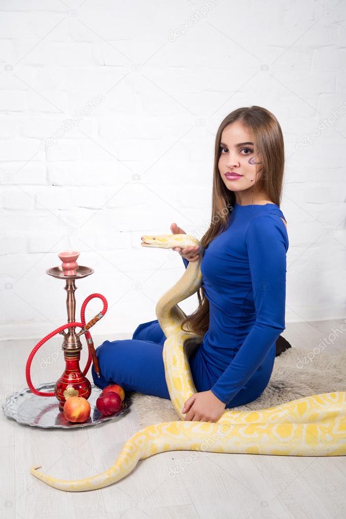 Beautiful woman with python — Stock Photo © OlgaOsa #111807810