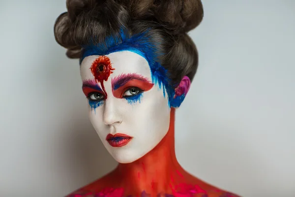 Crazy make up art Stock Photo by ©OlgaOsa 87769096