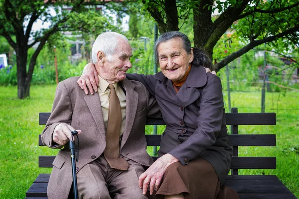 Cute 80 plus year old married couple posing for a portrait in their ...