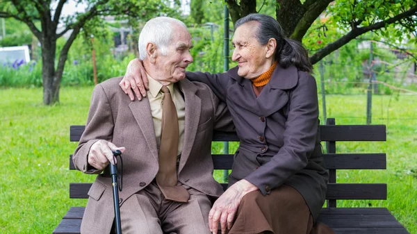 Cute 80 plus year old married couple posing for a portrait in their ...