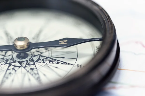 A compass on charts — Stock Photo © ravil_s #109823720