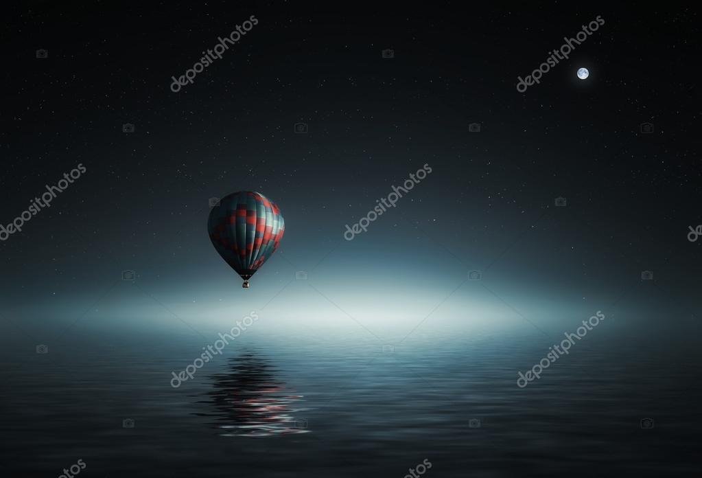 Air balloon flying over water Stock Photo by ©besmirhamiti 63006873