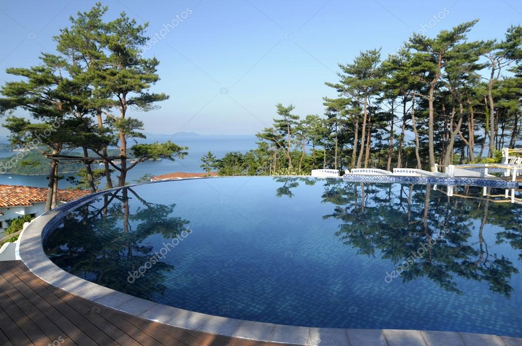 Spa resort hotel infinity swimming pool Stock Photo by ©david_franklin ...
