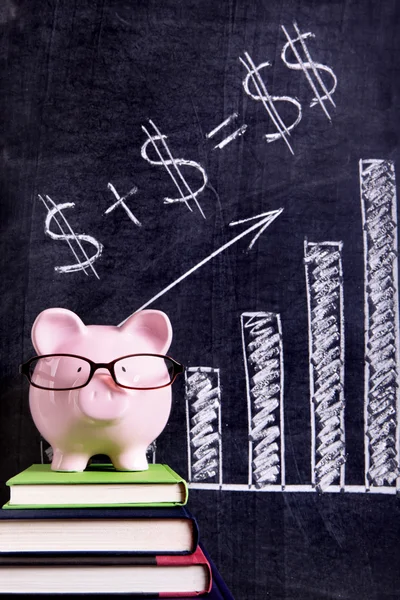 Piggy Bank with growth chart — Stock Photo © david_franklin #65950321