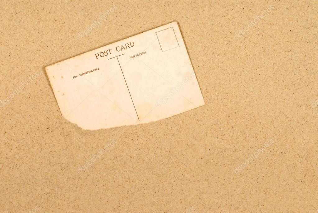 Old postcard in sand Stock Photo by ©david_franklin 67923857