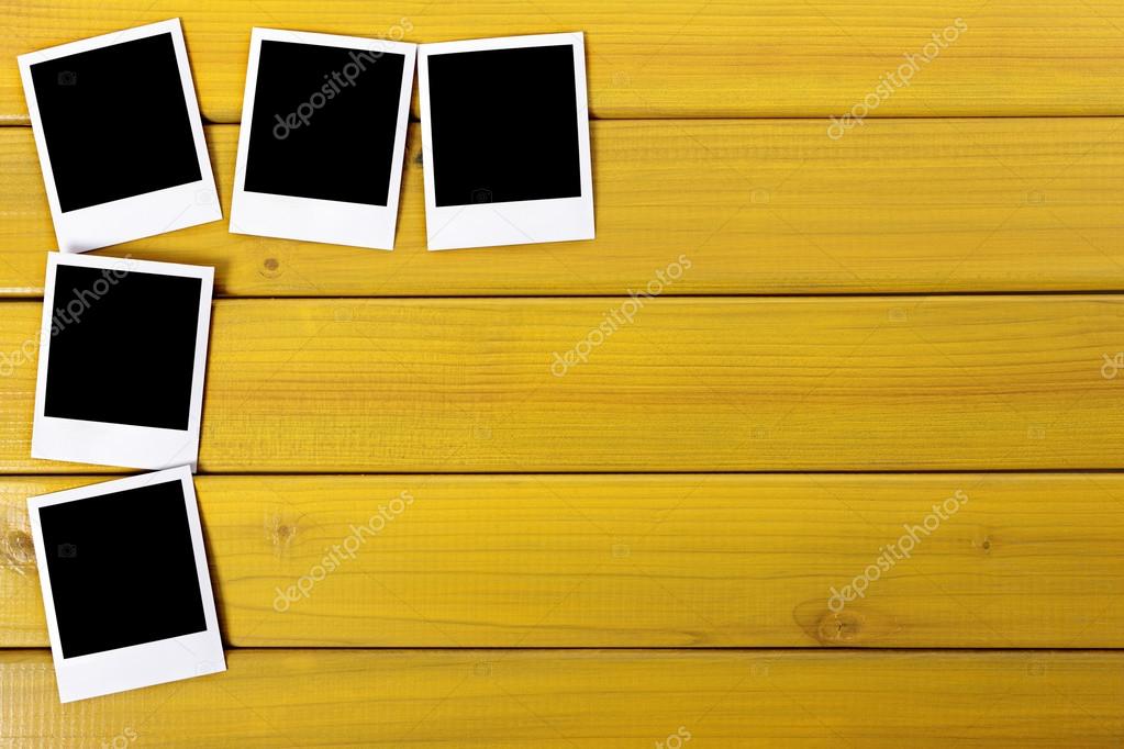 Blank photo prints on a table Stock Photo by ©david_franklin 69662581
