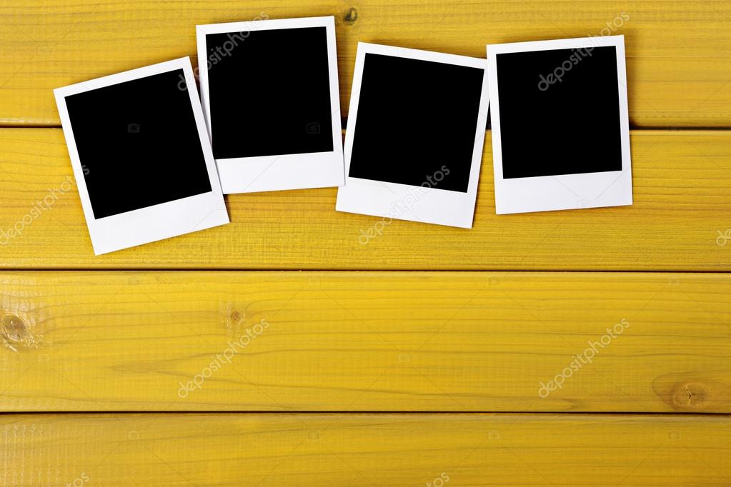 Blank photo prints on a table Stock Photo by ©david_franklin 69662639