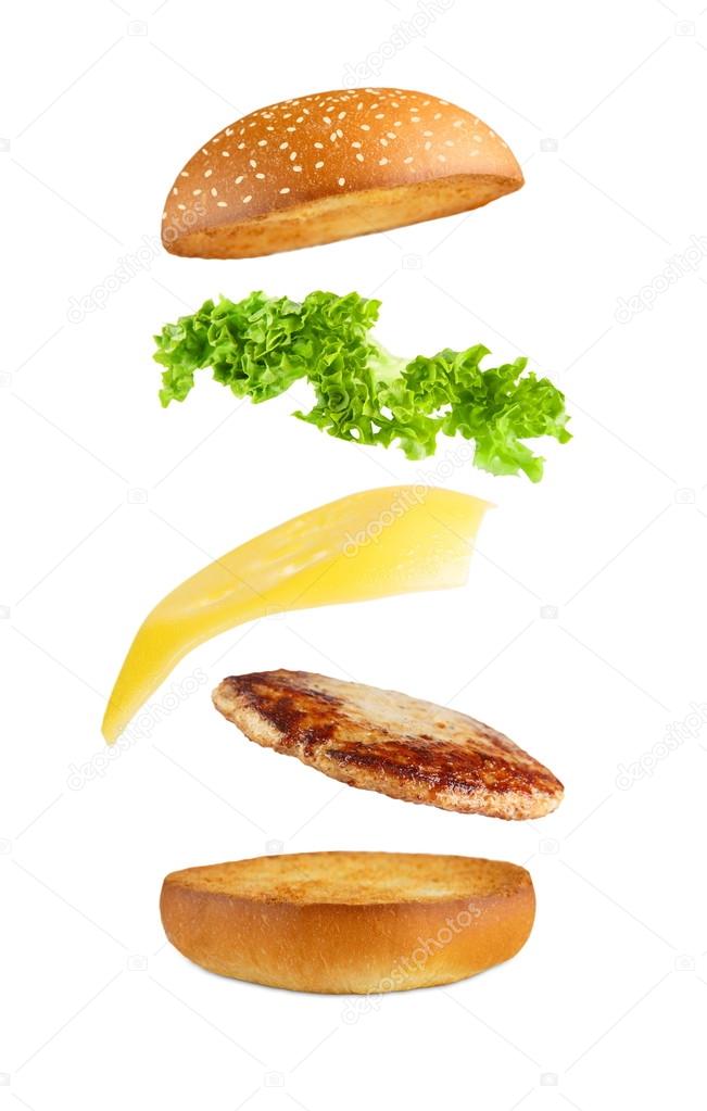 Burger explosion, flying layers isolated. — Stock Photo © Milkos #101745518