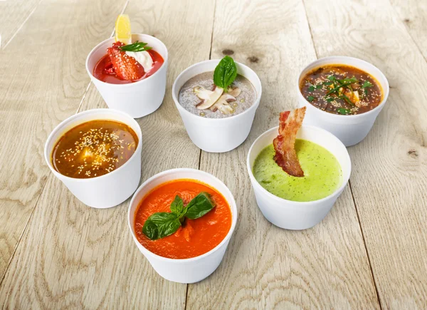 Variety of soups from different cuisines — Stock Photo © Milkos #115653446