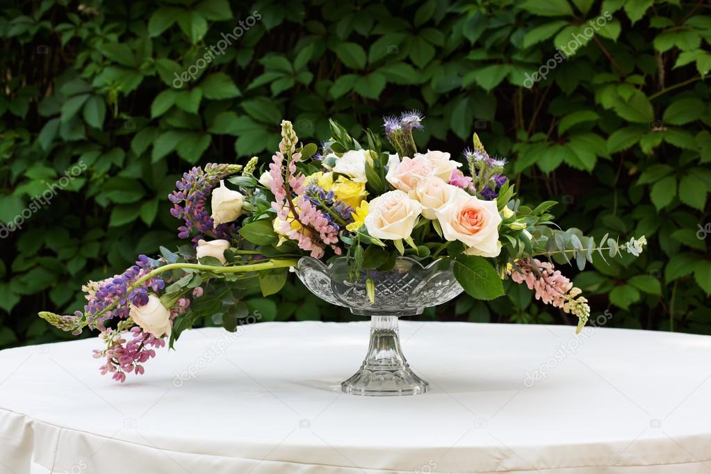 Beautiful flower bouquet outdoors. Wedding floristic decoration at ...