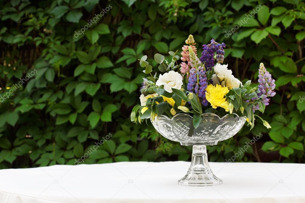 Beautiful flower bouquet outdoors. Wedding floristic decoration at ...