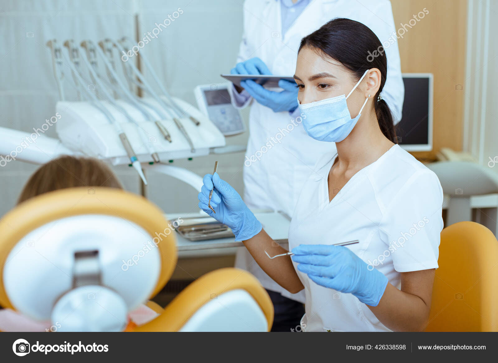Painless treatment with modern professional dental equipment — Stock ...