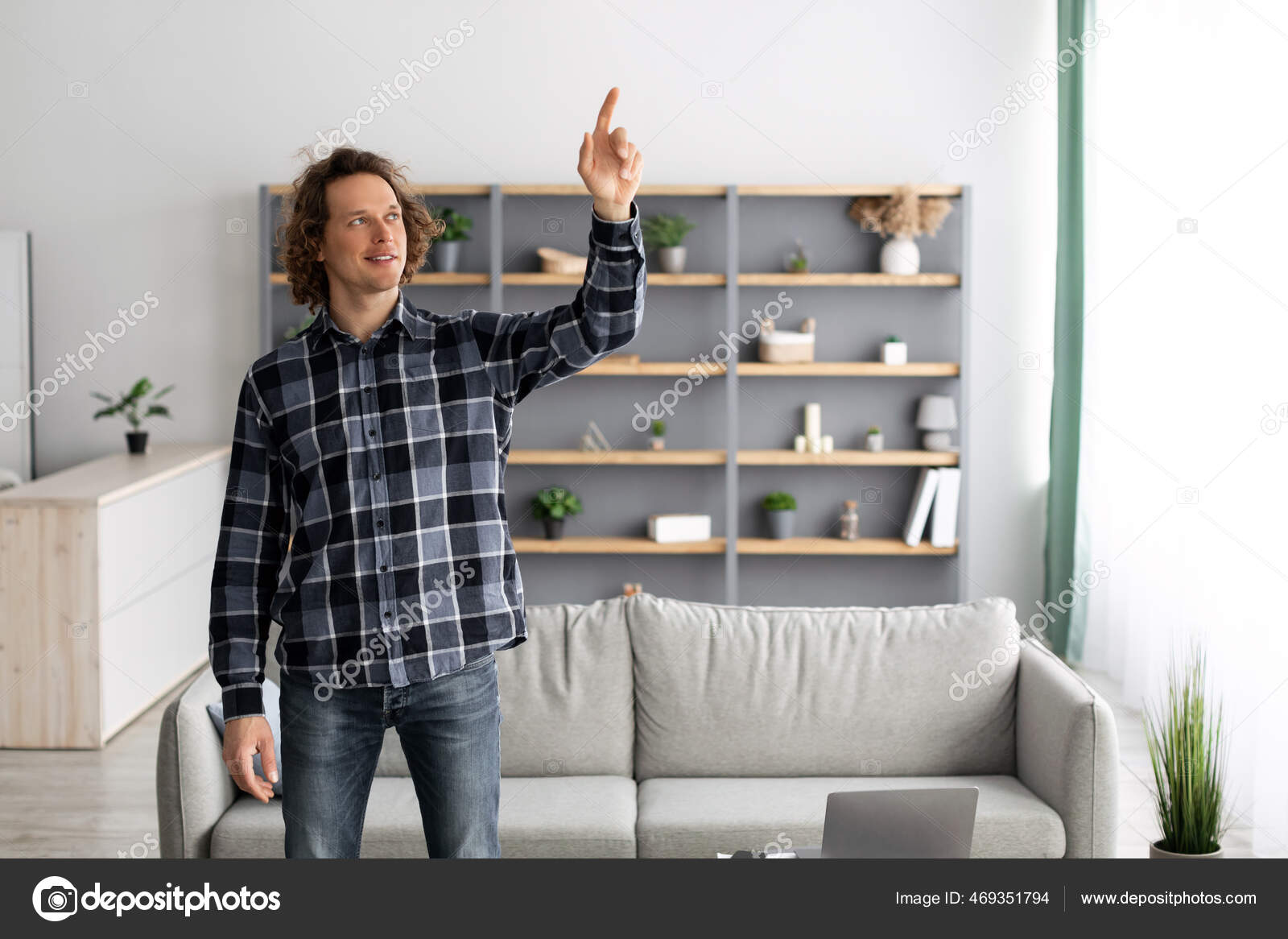 Man Pointing Finger Up Pushing Button On Invisible Screen Indoors ...