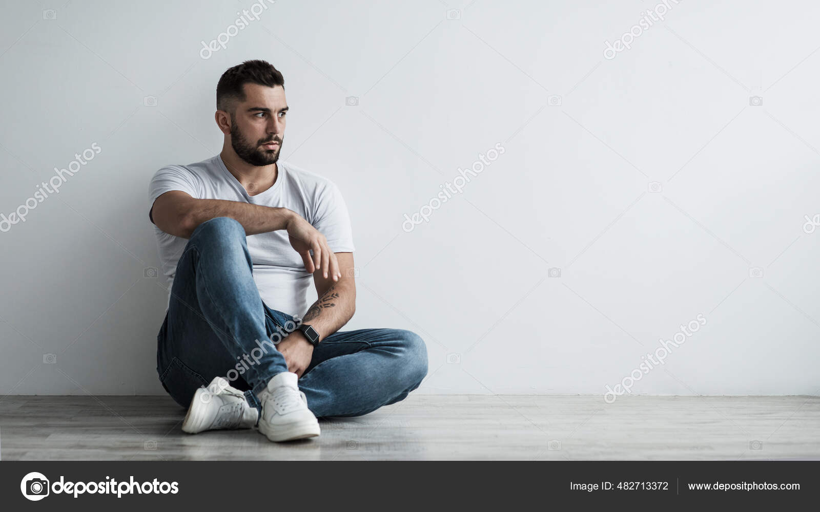 Lonely handsome man sad, stressed in self-isolation, suffering ...