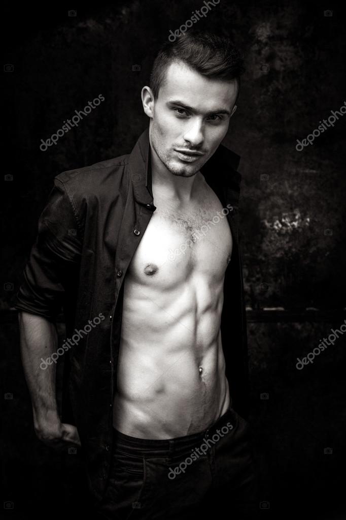 Strong Athletic Man Fitness Model Stock Photo by ©smmartynenko 105711462