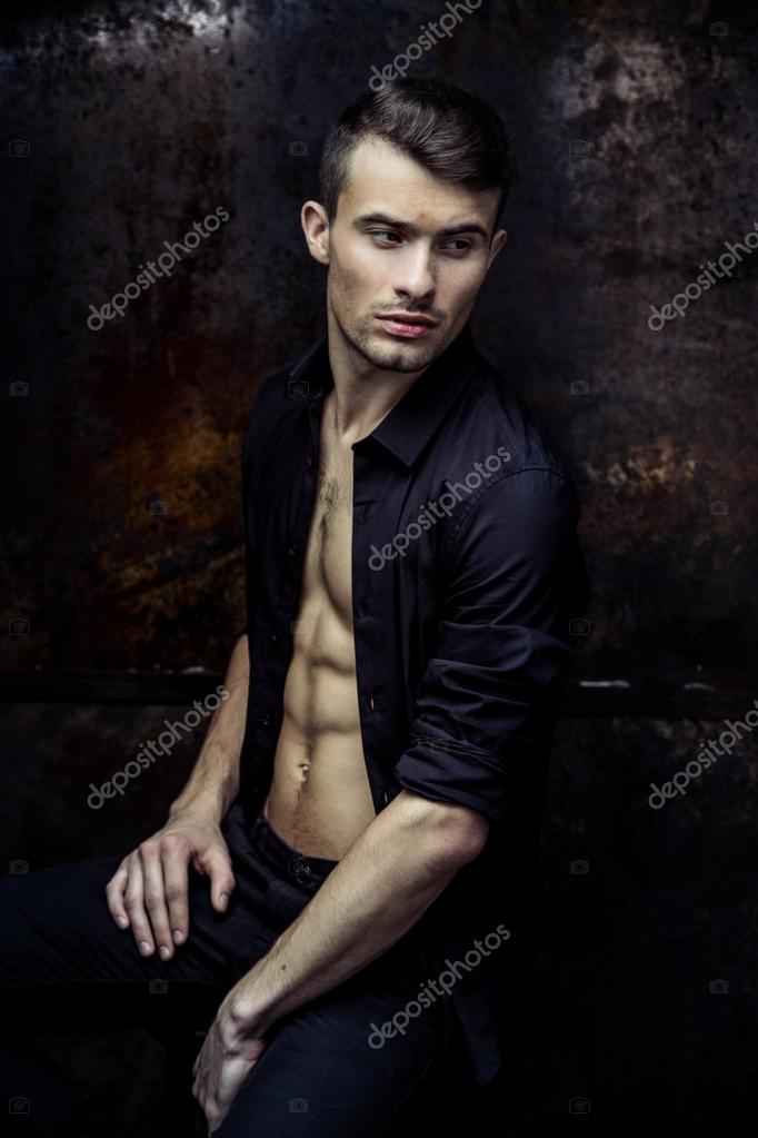 Strong Athletic Man Fitness Model Stock Photo by ©smmartynenko 105711474