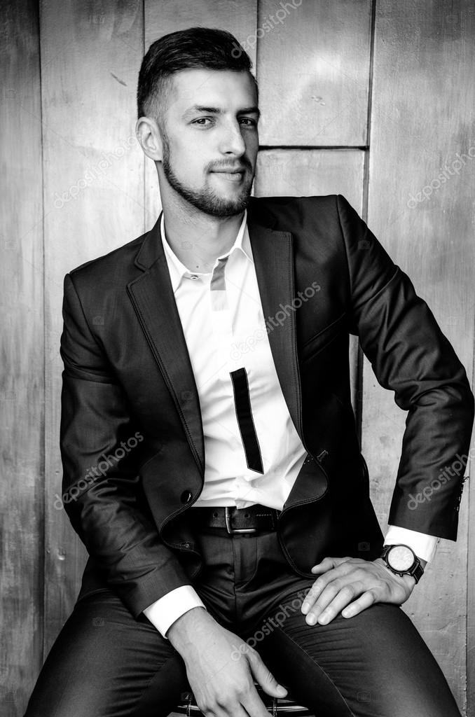 Handsome man in suit Stock Photo by ©smmartynenko 113525028