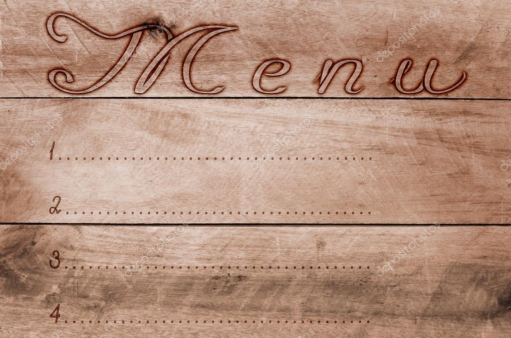 Word menu written, burned lettering on wooden brown background. Stock ...