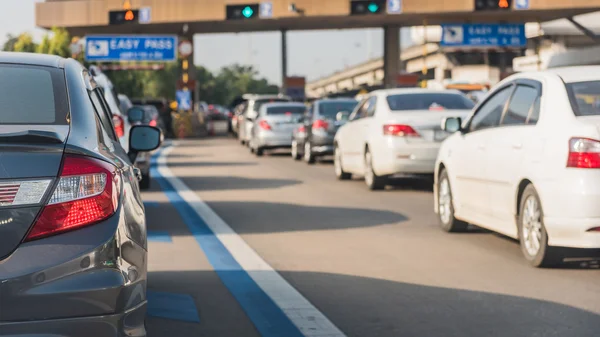 Car queue in front of express way gate - Stock Image - Everypixel