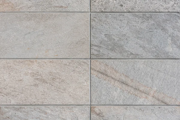 Natural sand stone tile wall seamless background Stock Photo by ...