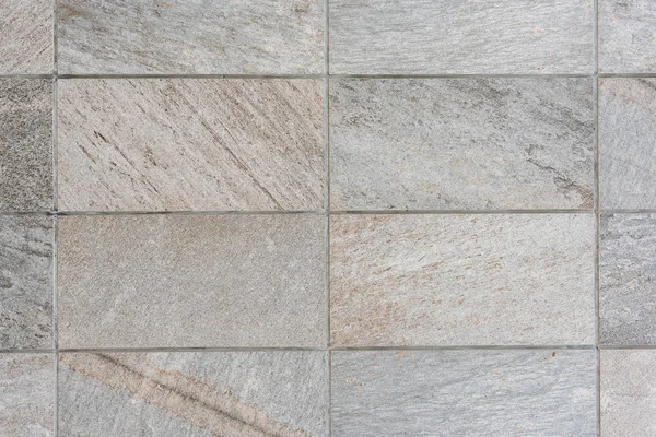 Natural sand stone tile wall seamless background Stock Photo by ...