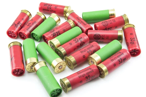 12 gauge shotgun shells isolated on a white background — Stock Photo ...