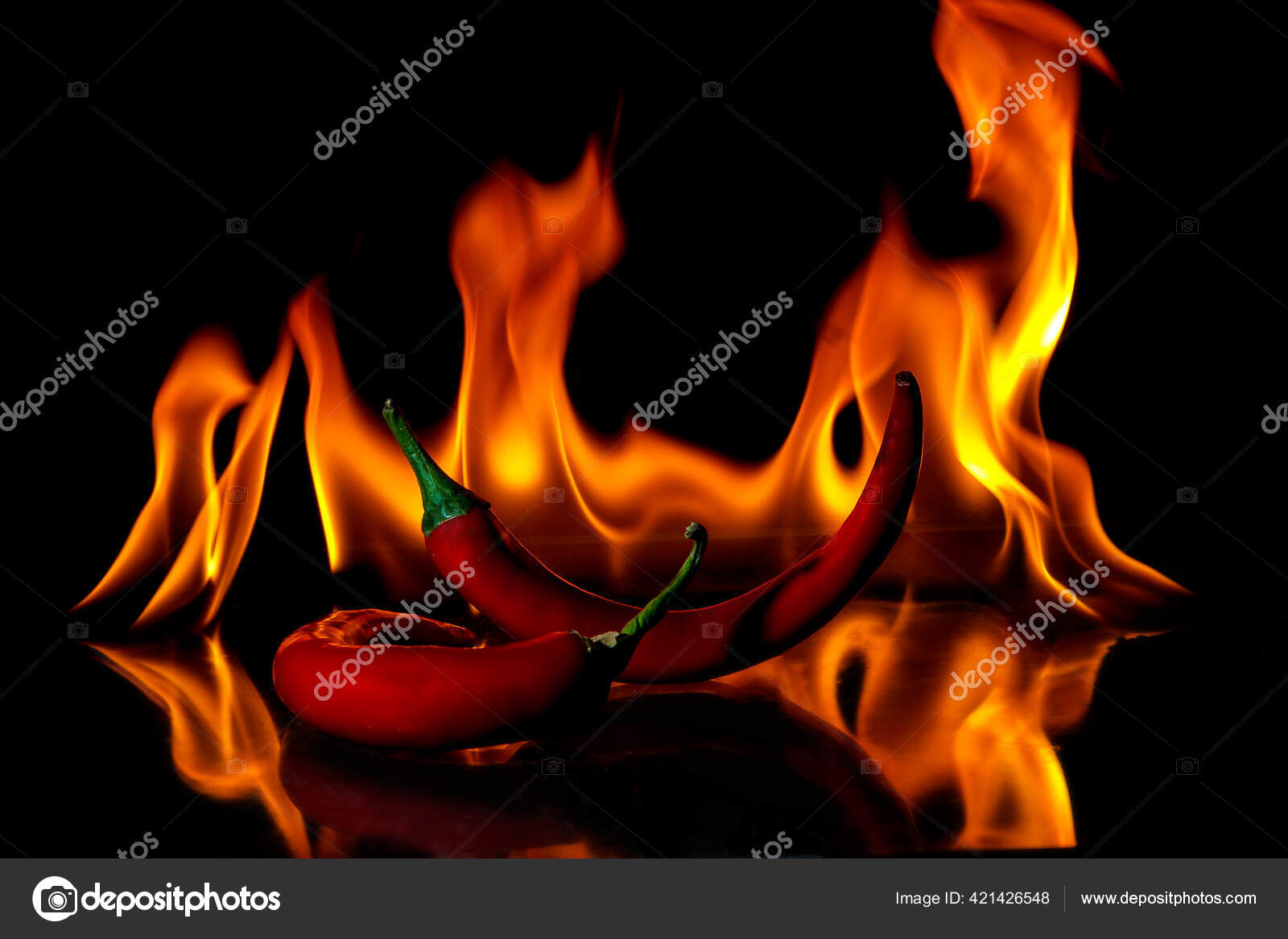 Red pepper on fire with reflection — Stock Photo © fotomir4you #421426548
