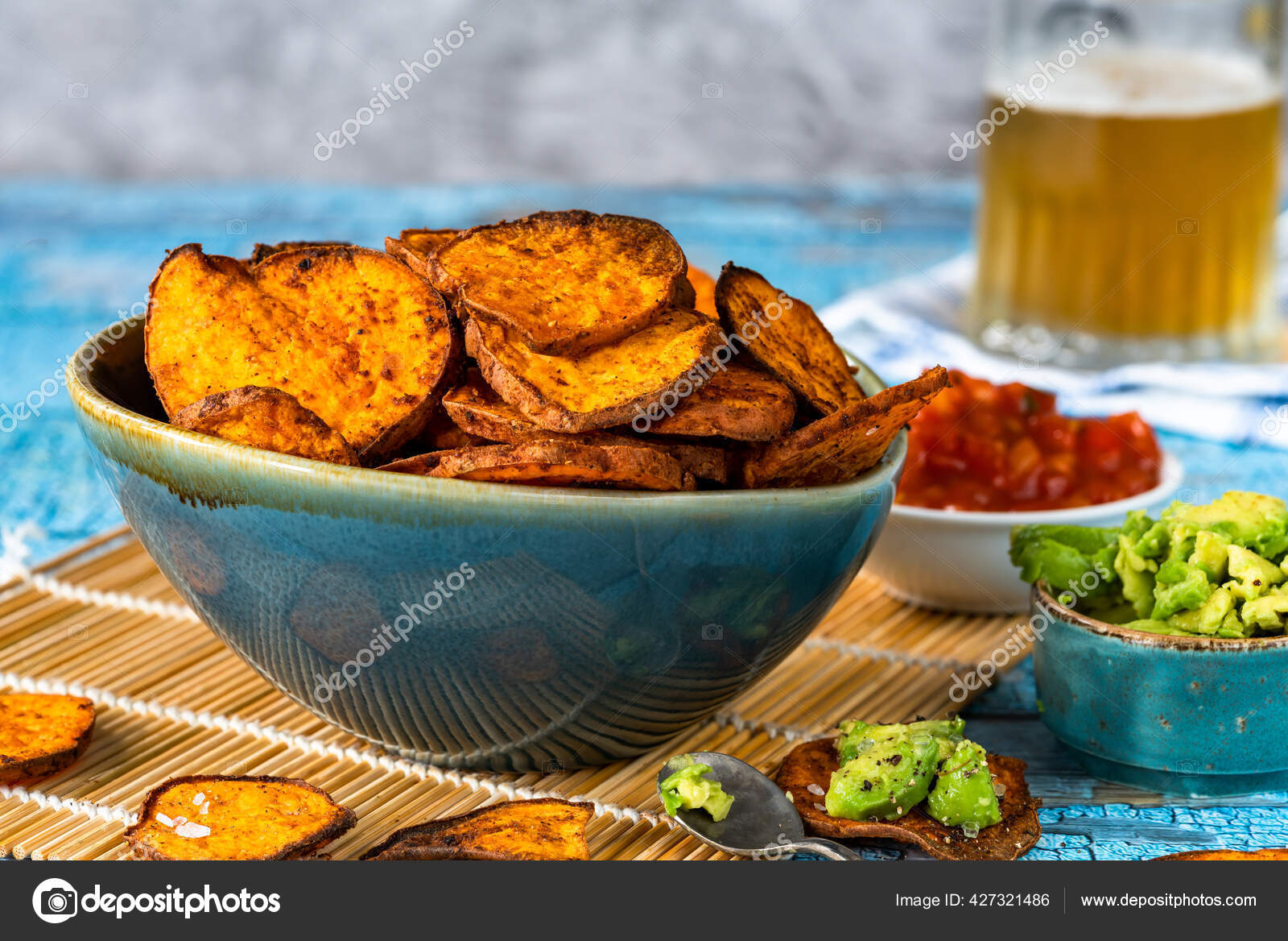 Homemade Spiced Sweet Potato Chips Smashed Avocado Tomato Salsa Stock ...