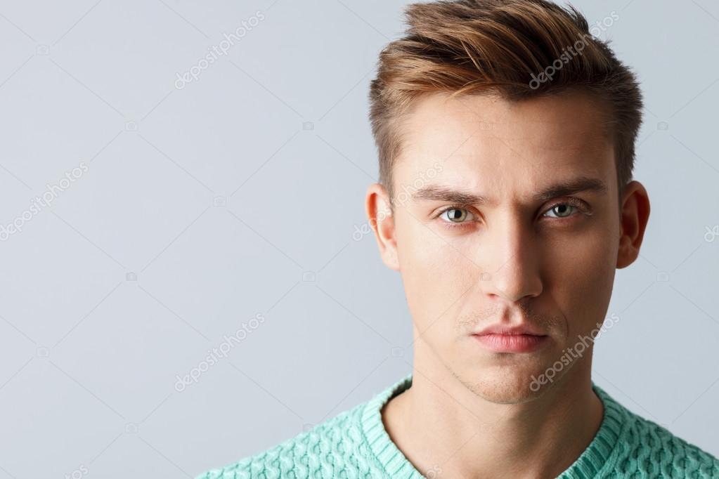 Serious handsome guy is expressing his masculinity Stock Photo by ...