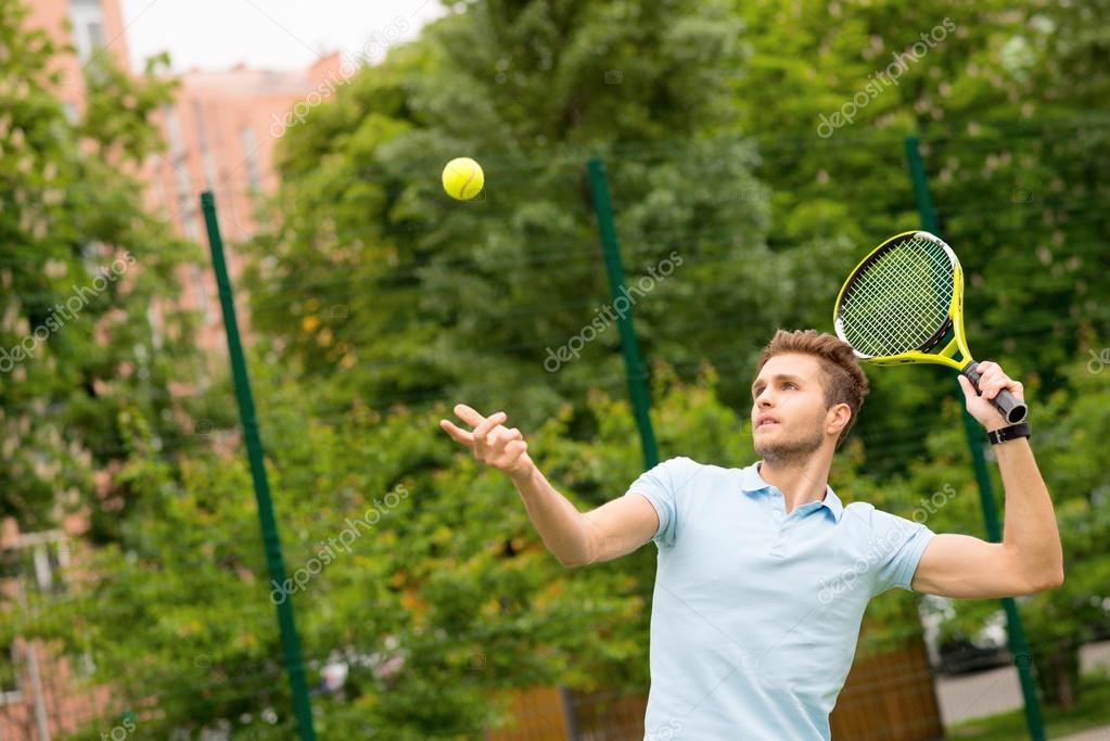 Professional athlete playing tennis on court — Stock Photo ...