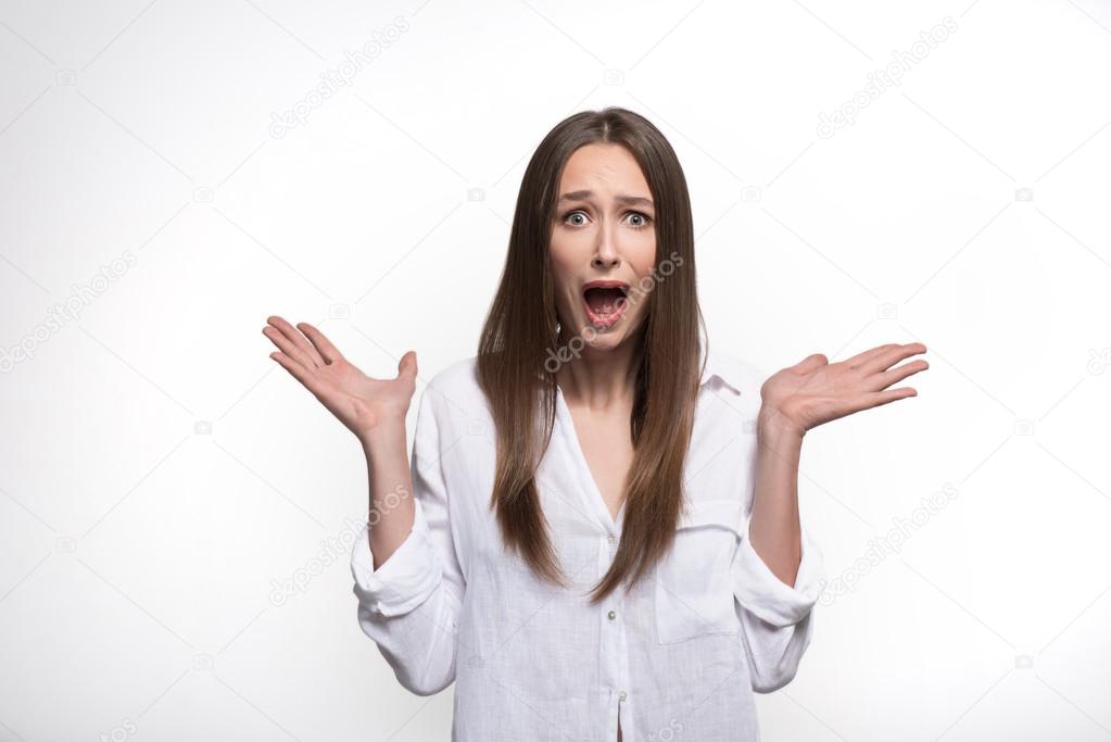 Shocked girl screaming with fear Stock Photo by ©iakovenko123 123903984