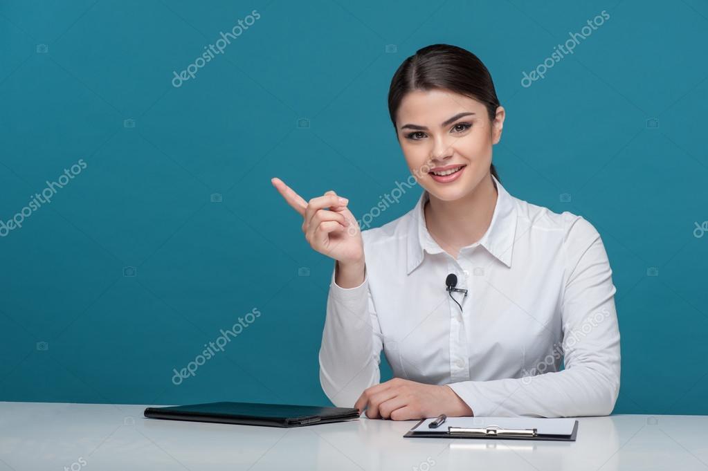 Beautiful girl tv newscaster with pretty smile reports Stock Photo by ...