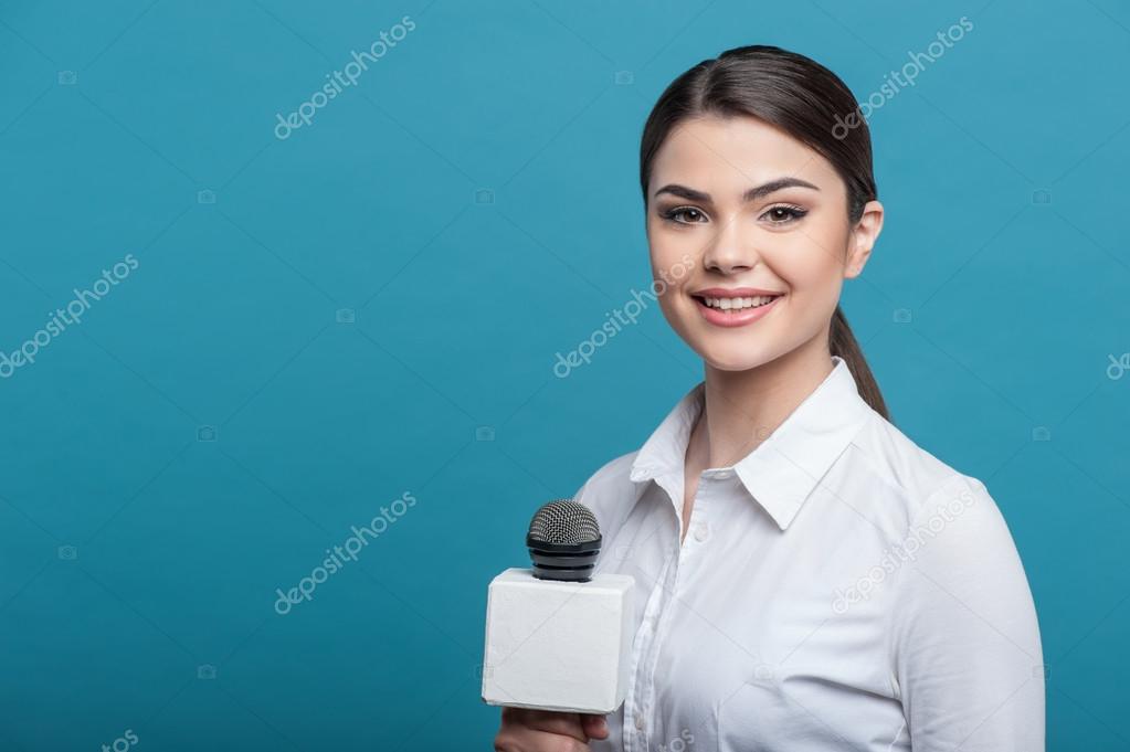 Beautiful girl TV journalist with pretty smile is reporting — Stock ...