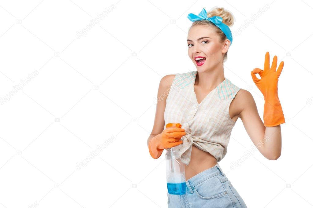Beautiful young girl is cleaning her house — Stock Photo © iakovenko123 ...